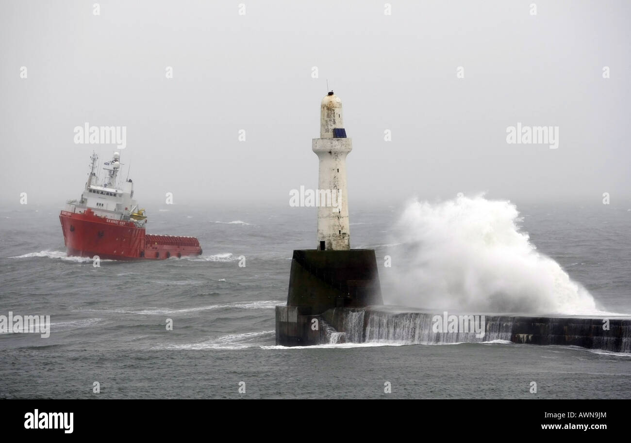 Oil supply vessel struggles to get into Aberdeen Harbour, Scotland, UK ...