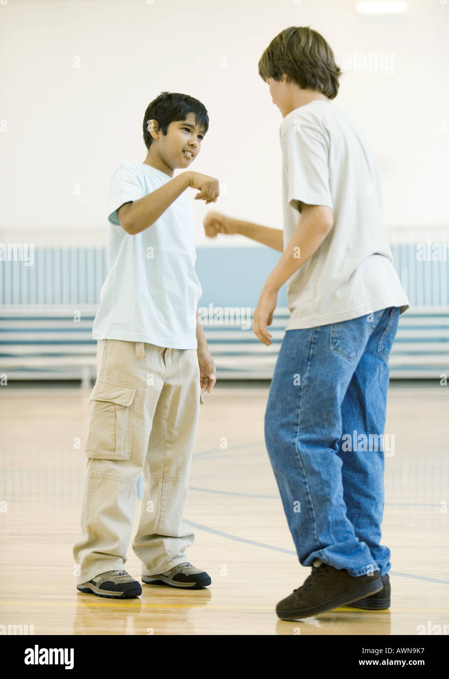 Two Boys Shaking Hands Children High Resolution Stock Photography and ...