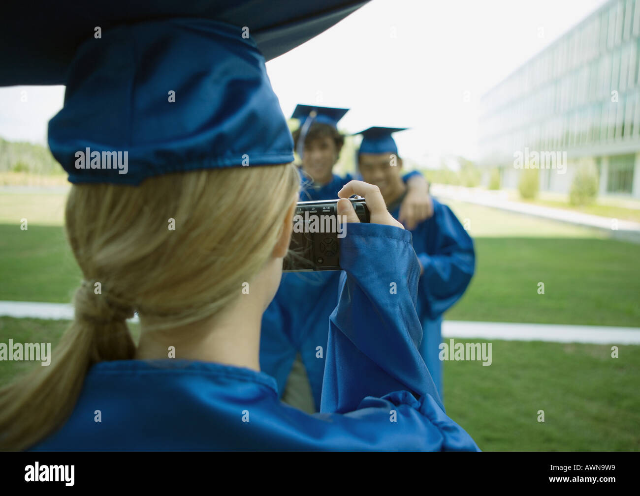 Male college graduate posing outdoors hi-res stock photography and ...
