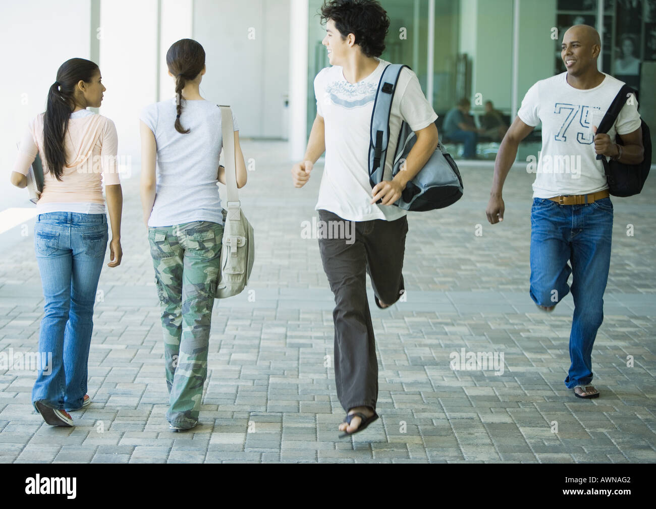 College students running on campus hi-res stock photography and images ...