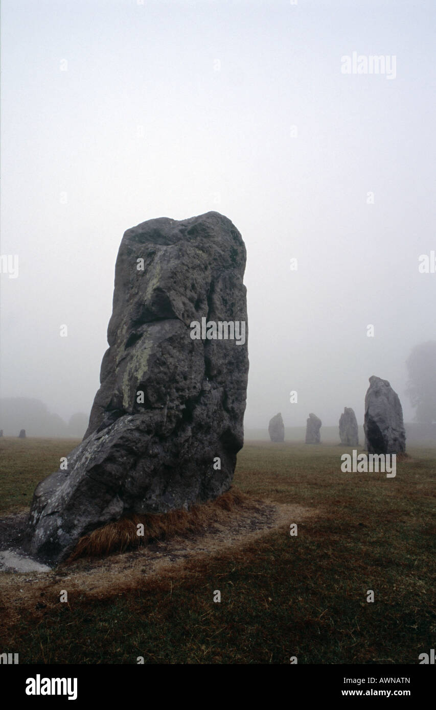 Standing stones/ circle. Huge block of stone standing on end. Mist ...