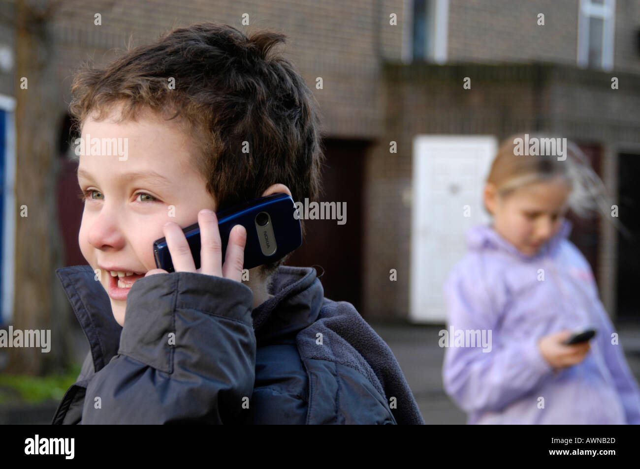 Child talking on mobile phone, England, UK Stock Photo - Alamy