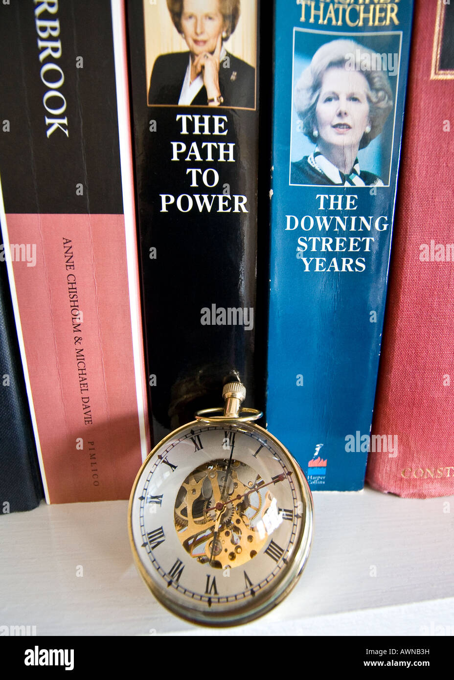 margaret thatcher books with old fashioned clock Stock Photo - Alamy