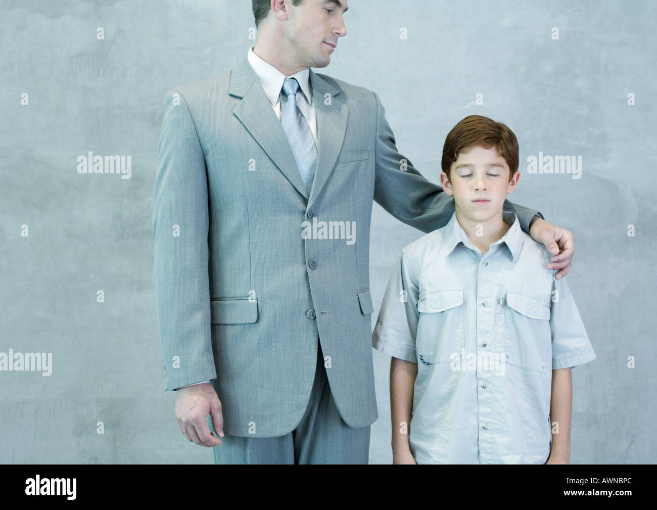 Three men putting arms around hi-res stock photography and images - Alamy