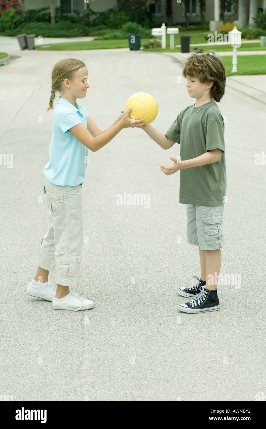 Children playing ball games street hi-res stock photography and images ...