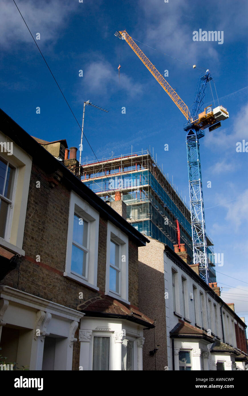 Row houses construction crane hi-res stock photography and images - Alamy
