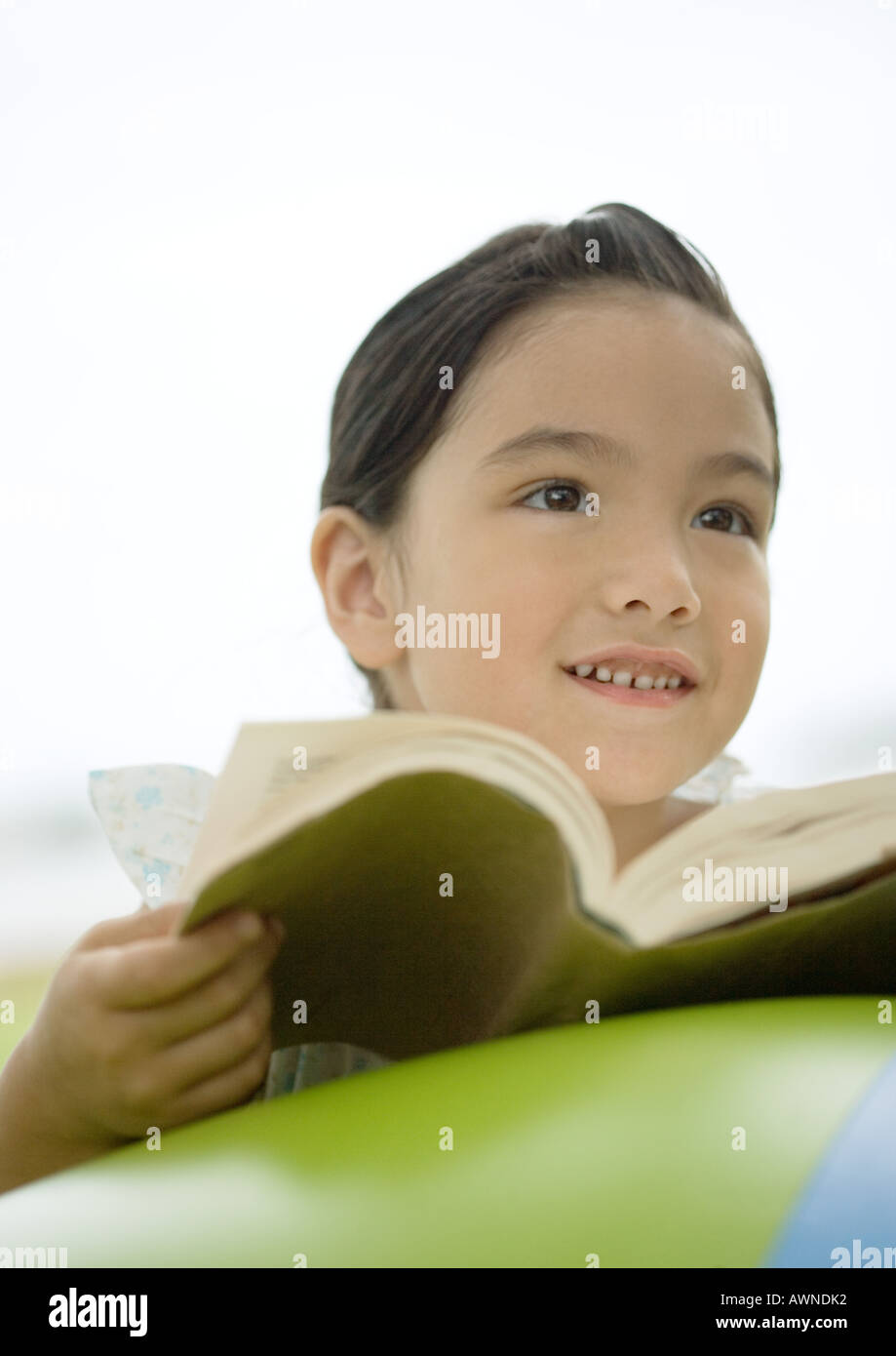 Girl with book Stock Photo - Alamy