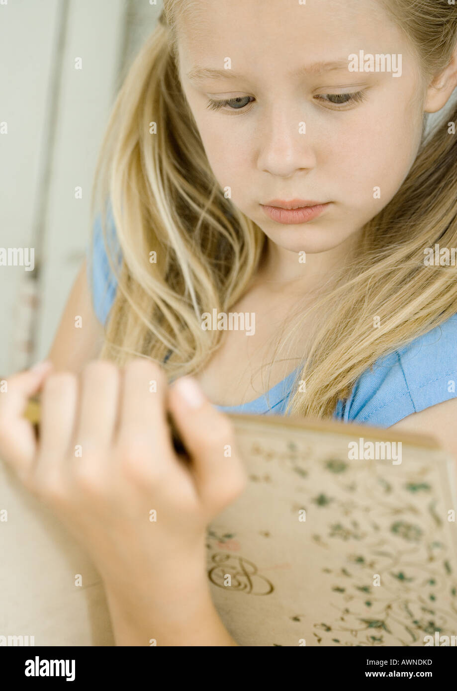 Girl reading book Stock Photo - Alamy