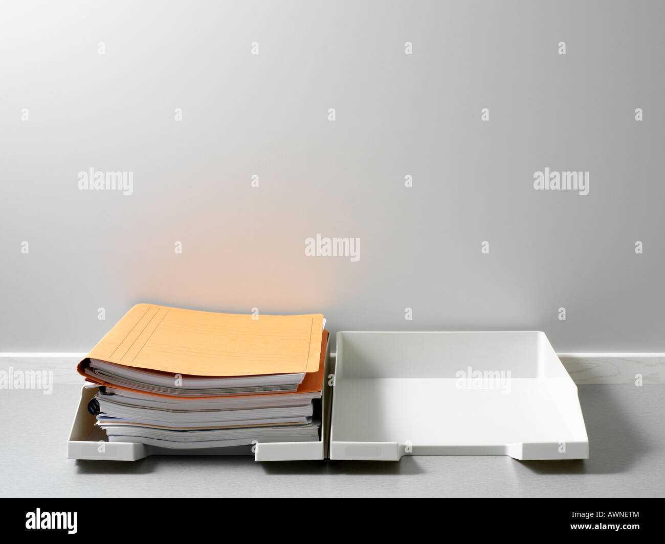 An empty and full paper tray Stock Photo - Alamy