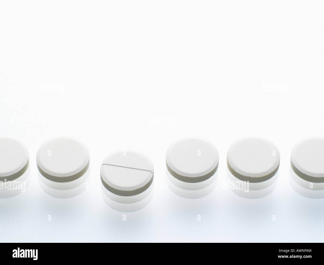 Tablets in a row Stock Photo - Alamy