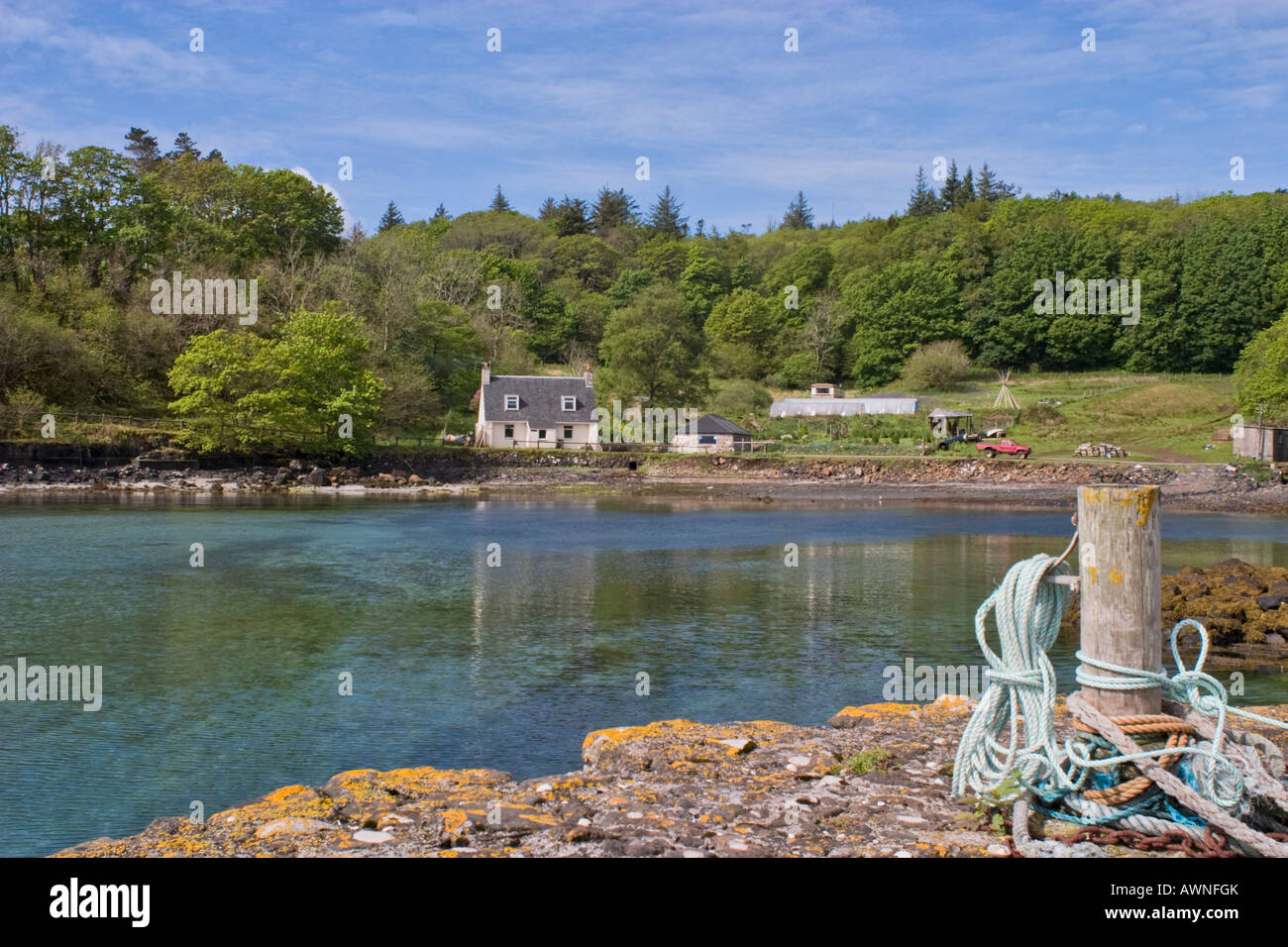 Shore Cottage, scenes around the Isle of Eigg Stock Photo - Alamy