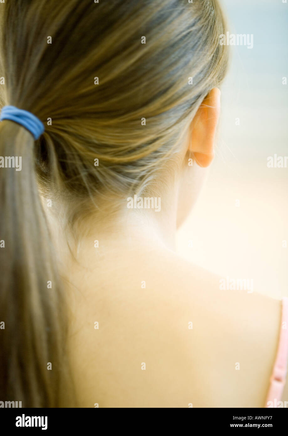 Teen girl with ponytail, close-up rear view of head and back Stock ...