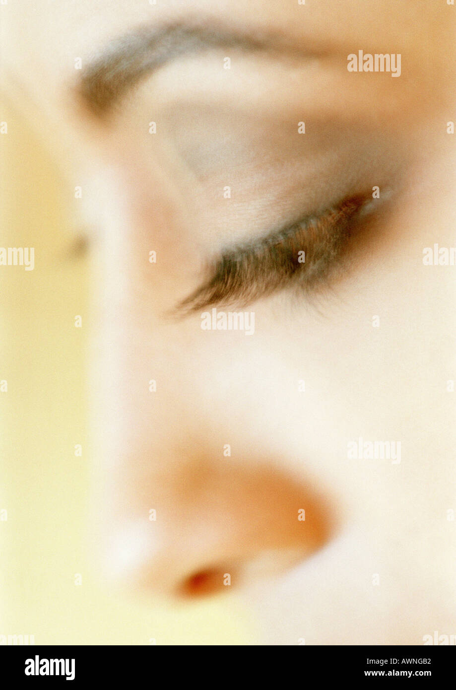 Woman's lowered eye, close-up Stock Photo - Alamy