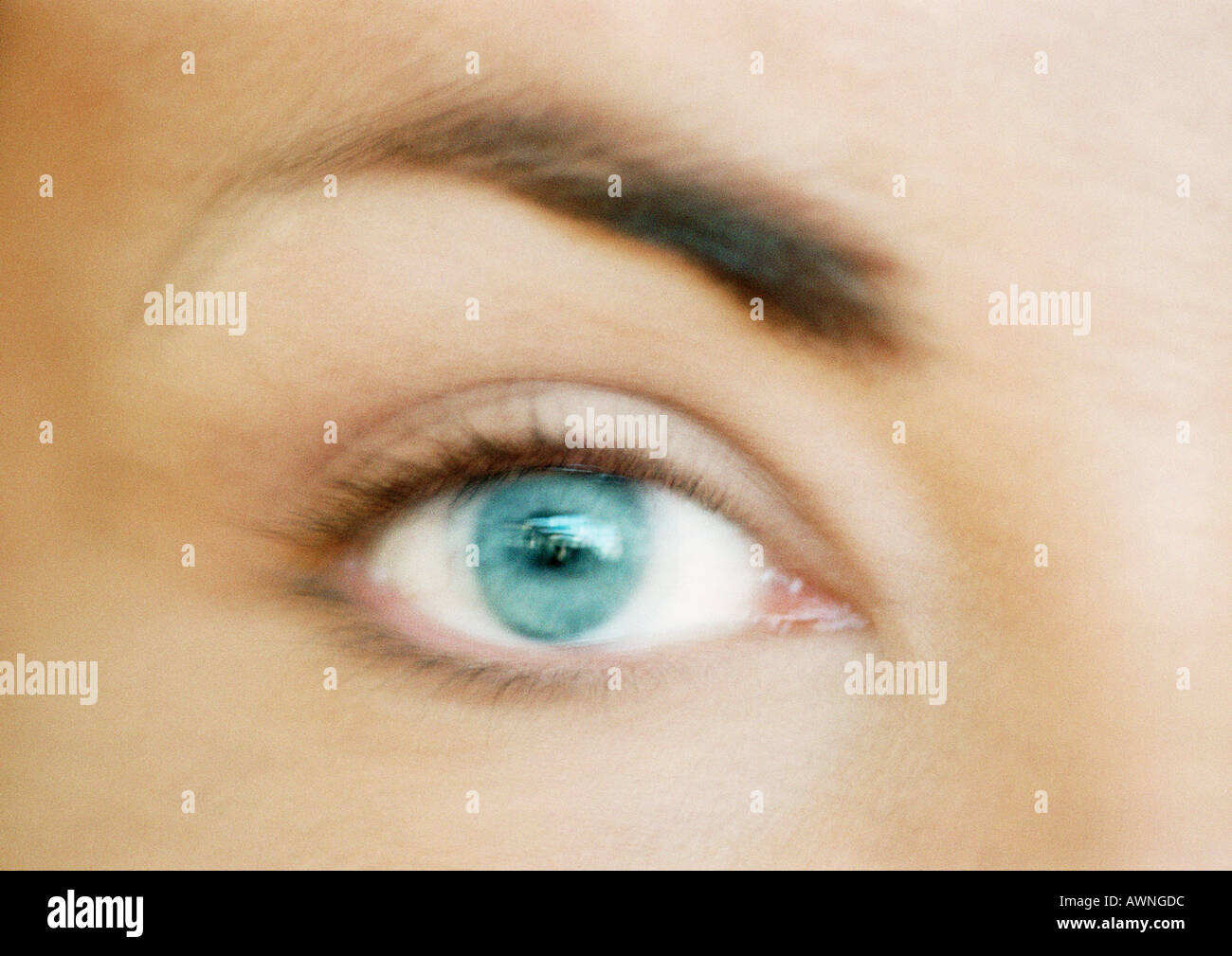 Woman's green-blue eye, close-up, blurry Stock Photo - Alamy