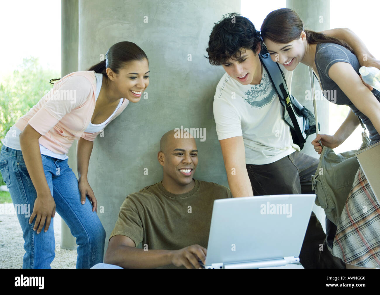 Group young students around laptop hi-res stock photography and images ...