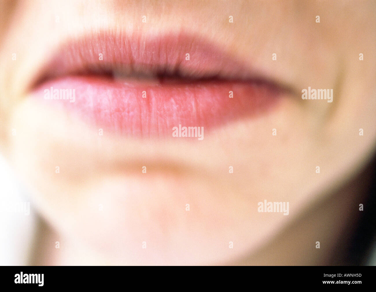 Close up of woman's mouth frowning, blurry Stock Photo - Alamy