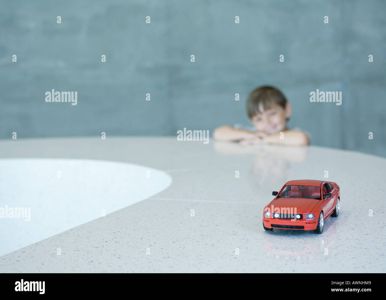 Kids hand holding toy car hi-res stock photography and images - Alamy