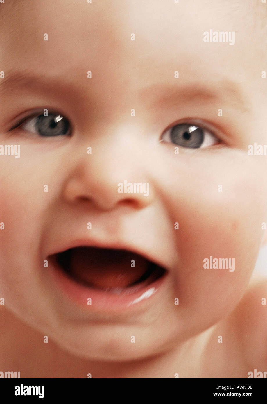 Baby with open mouth, close-up Stock Photo - Alamy