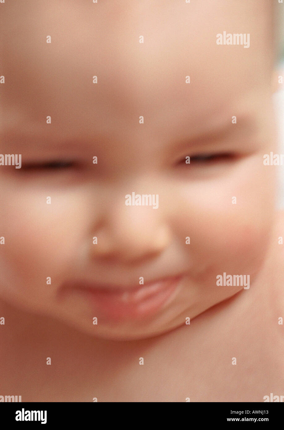 Baby squinting hi-res stock photography and images - Alamy