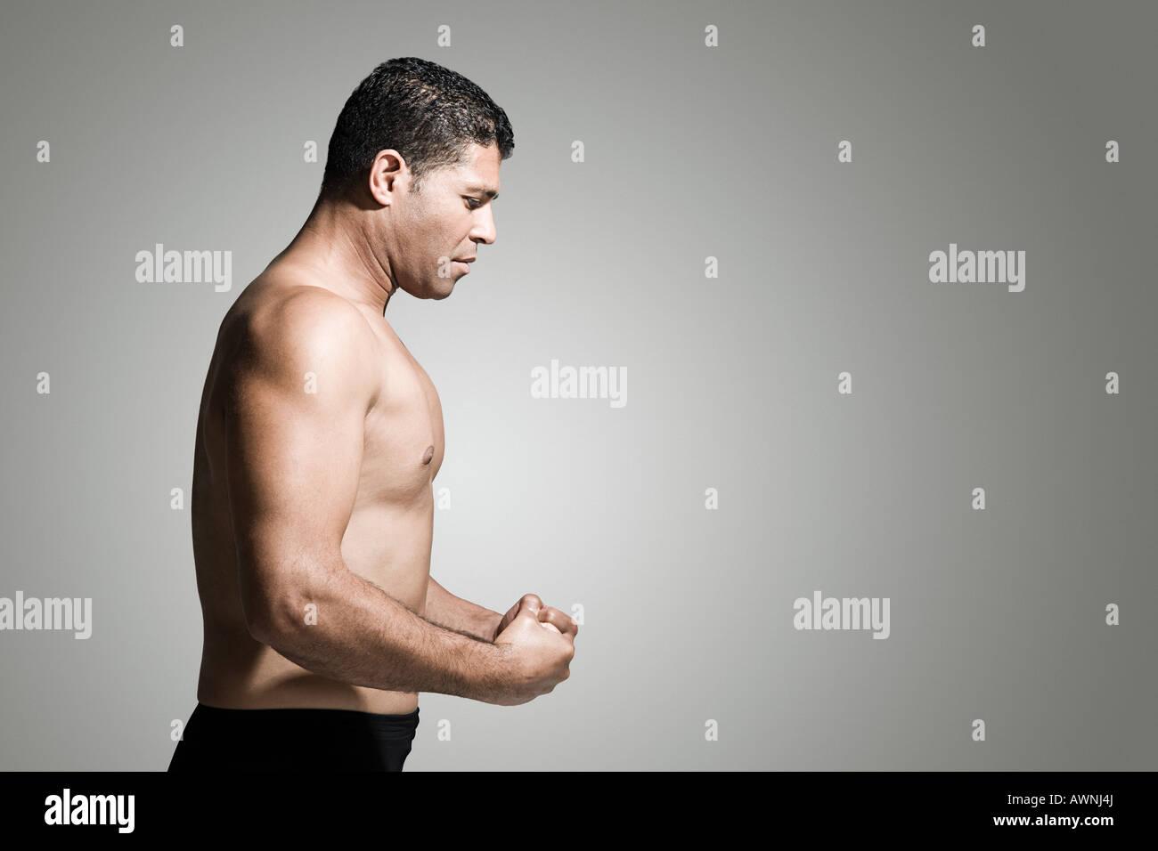 Profile of a muscular man Stock Photo - Alamy