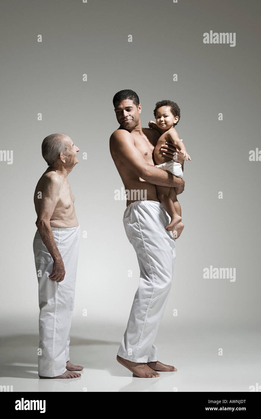 Three generations of males Stock Photo - Alamy