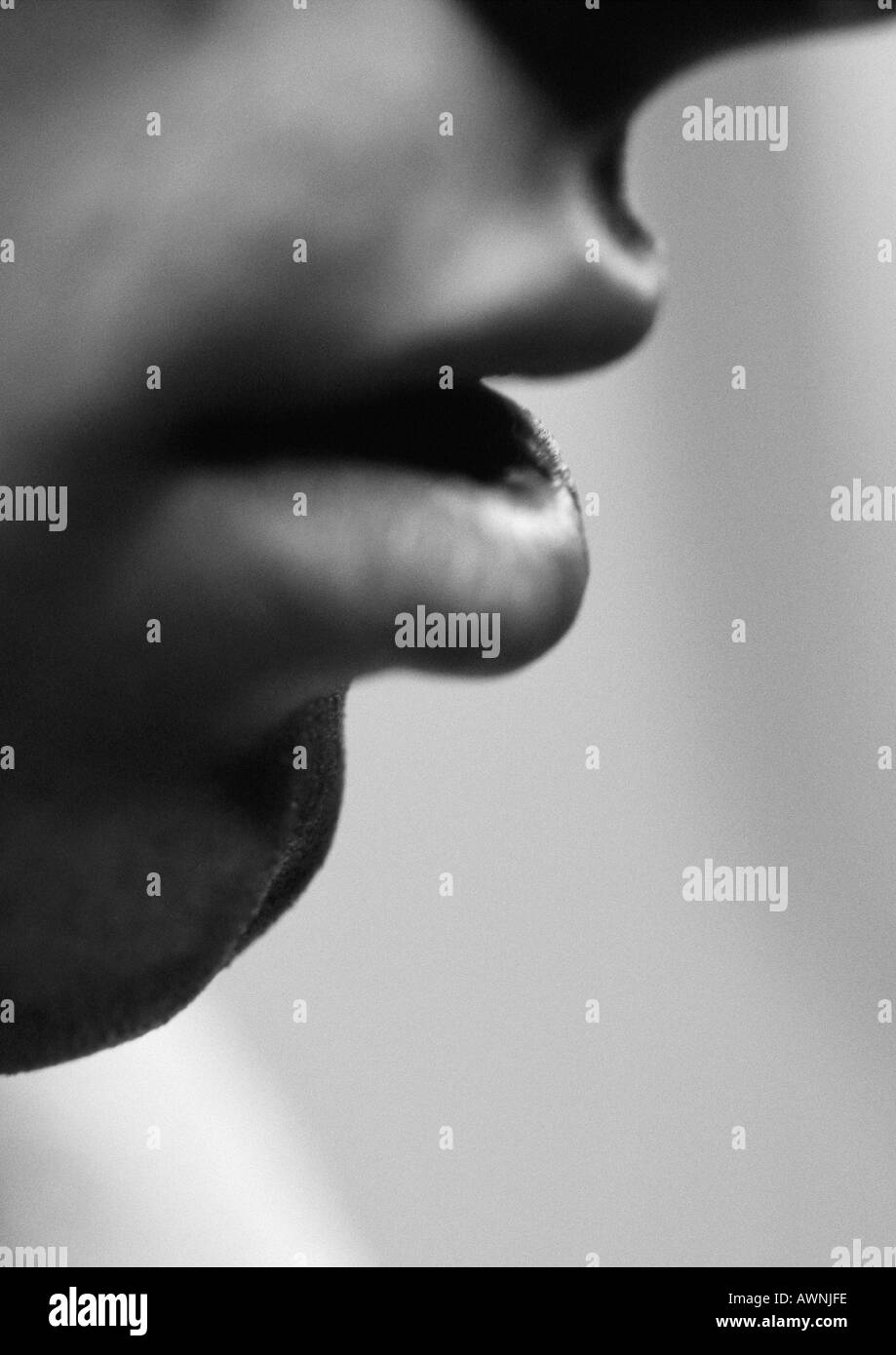 Man's lips, side view, close-up, black and white Stock Photo - Alamy