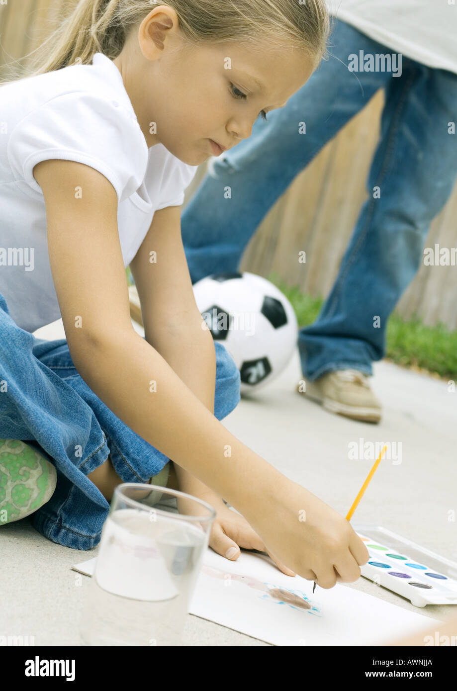 Girl painting outdoors Stock Photo - Alamy