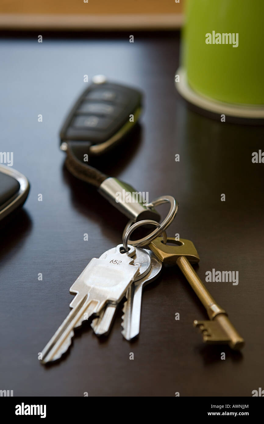 Keys on a table Stock Photo - Alamy