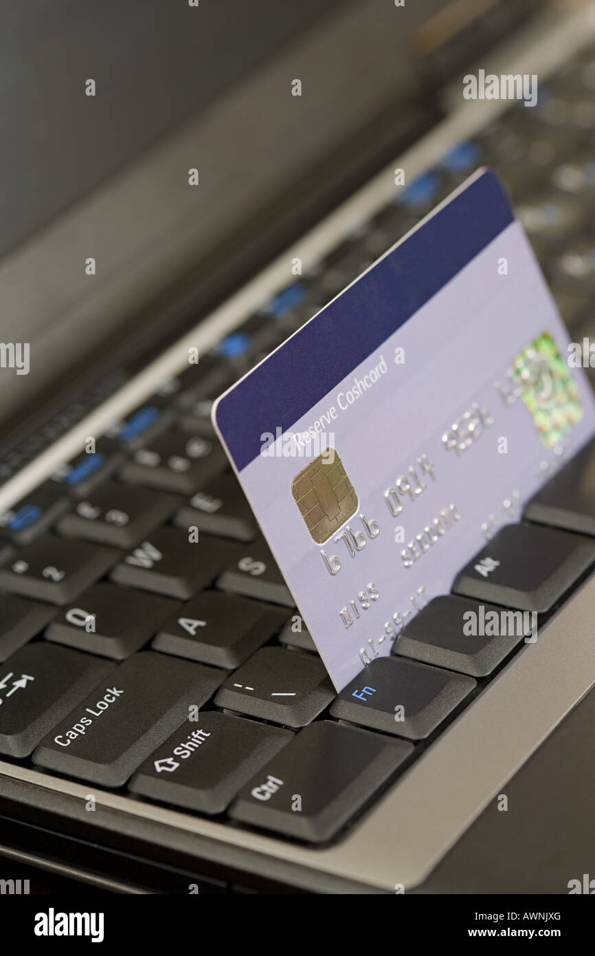 A laptop and a credit card Stock Photo - Alamy