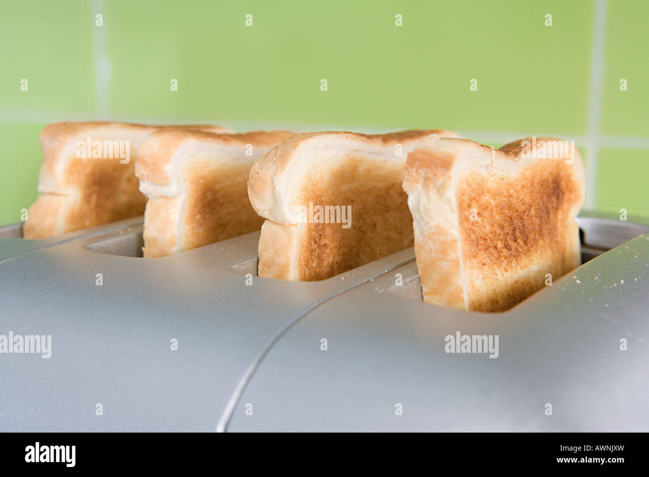 Toast in a toaster Stock Photo - Alamy