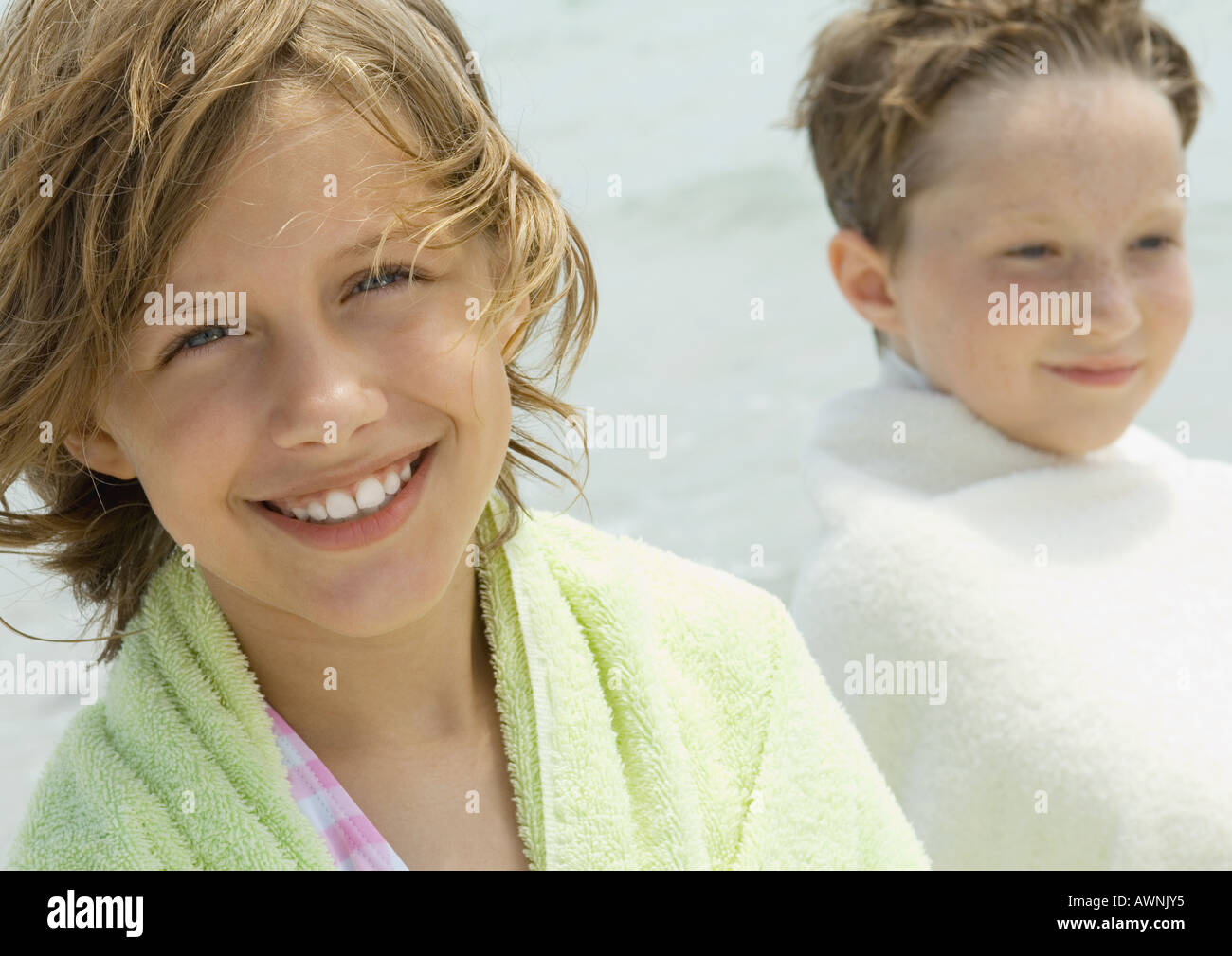 Children wrapped in towels Stock Photo - Alamy