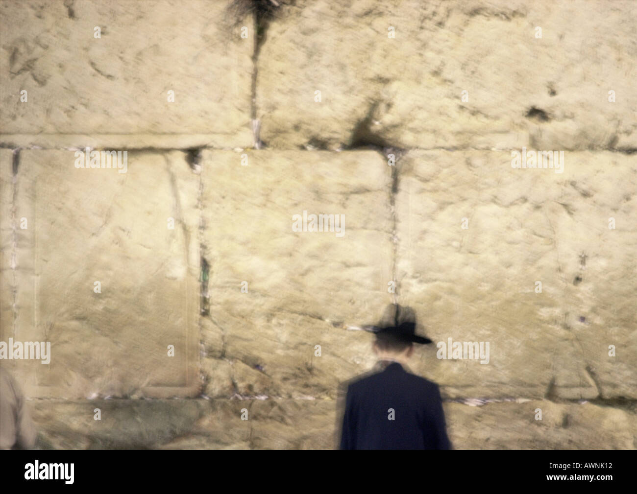 Israel, Jerusalem, man standing in front of Wailing Wall Stock Photo ...
