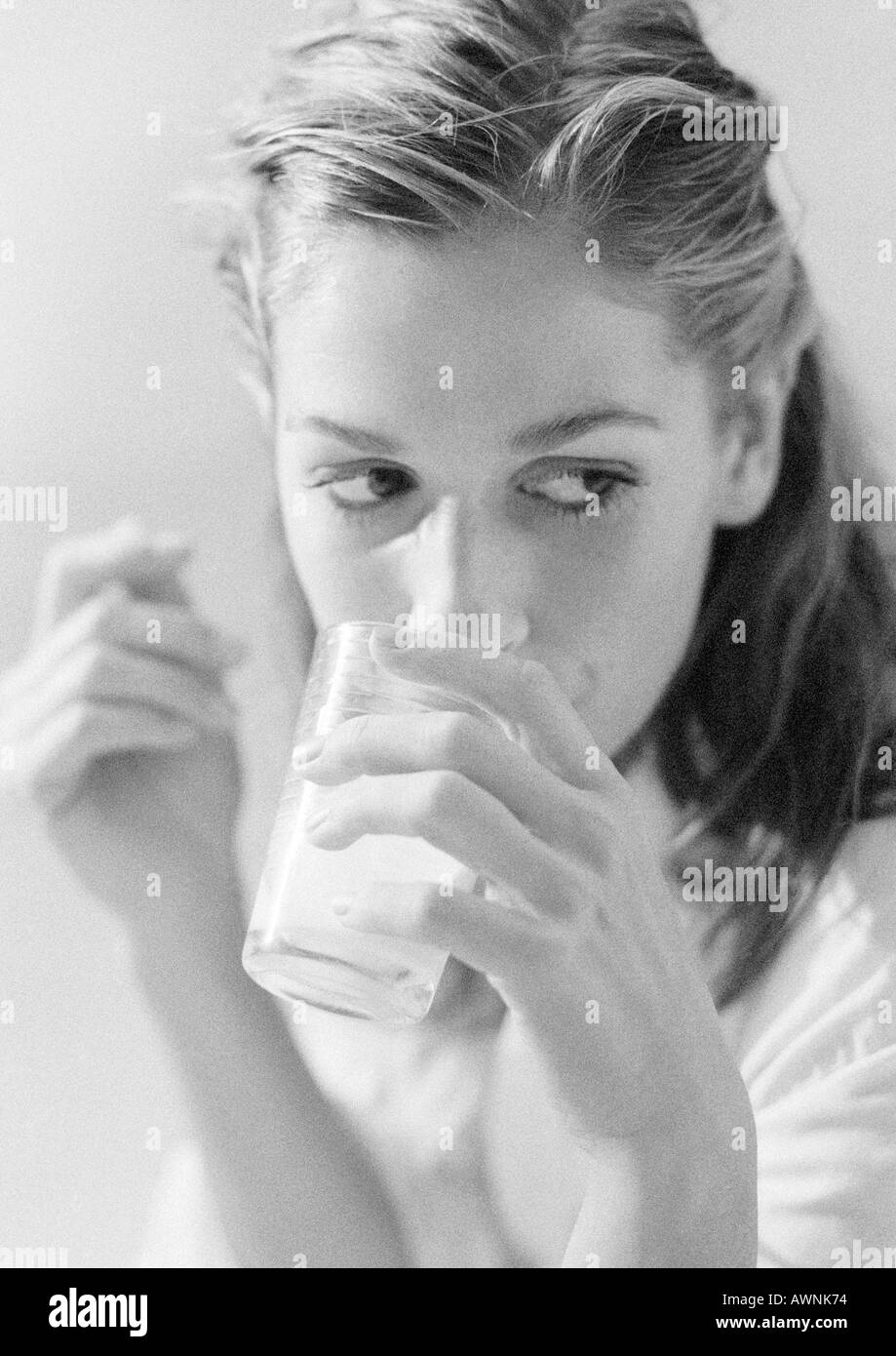 Woman and drinking milk Black and White Stock Photos & Images - Alamy