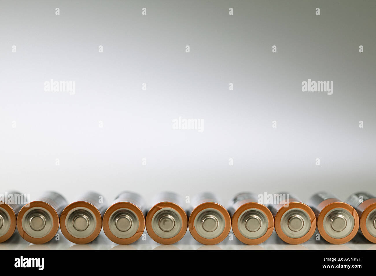 Batteries in a row Stock Photo - Alamy
