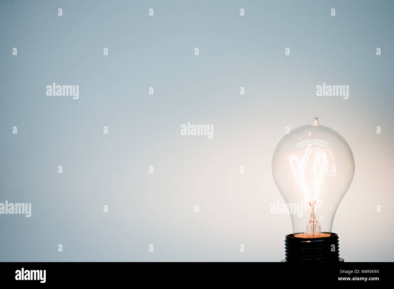 An illuminated lightbulb Stock Photo - Alamy