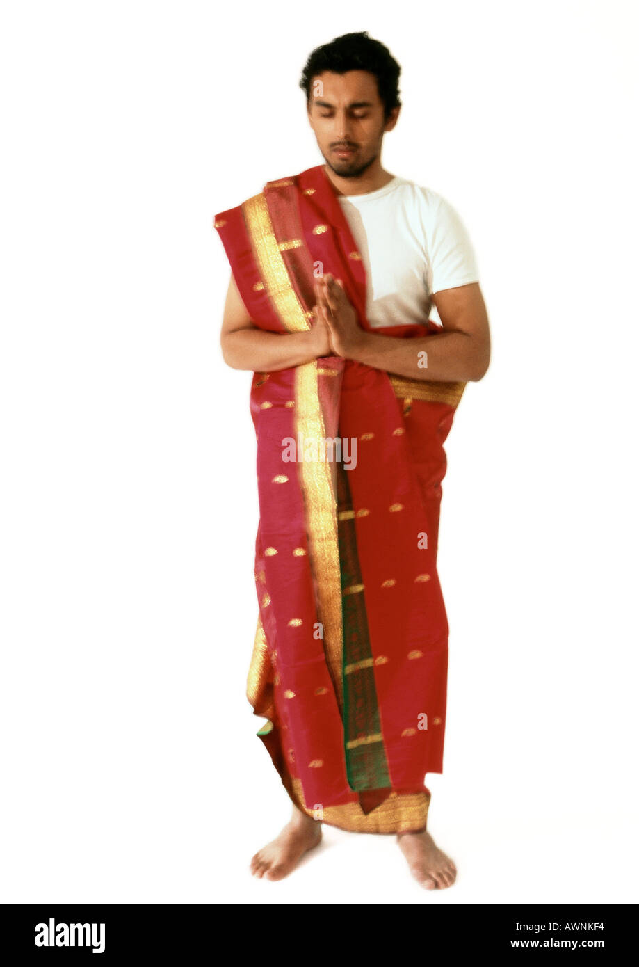 Hindu man standing and praying, full length Stock Photo - Alamy
