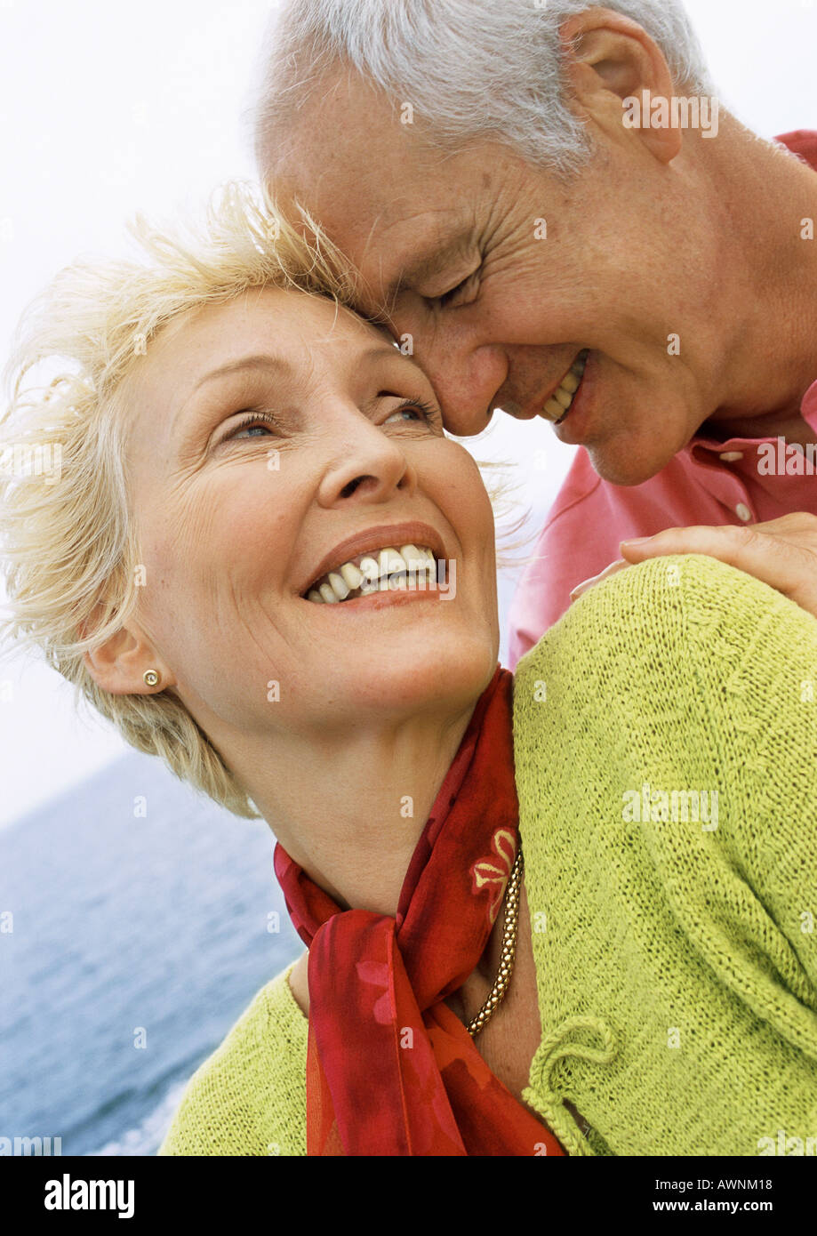 Mature couple forehead to forehead, close-up Stock Photo - Alamy
