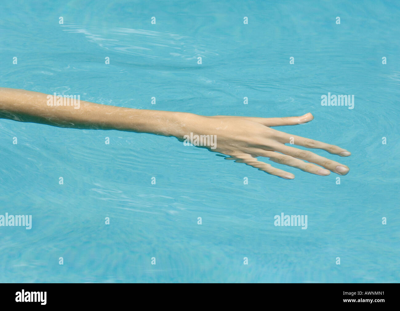 Woman's arm in water Stock Photo - Alamy