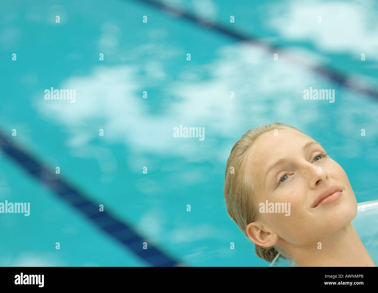 Women sitting near pool hi-res stock photography and images - Alamy