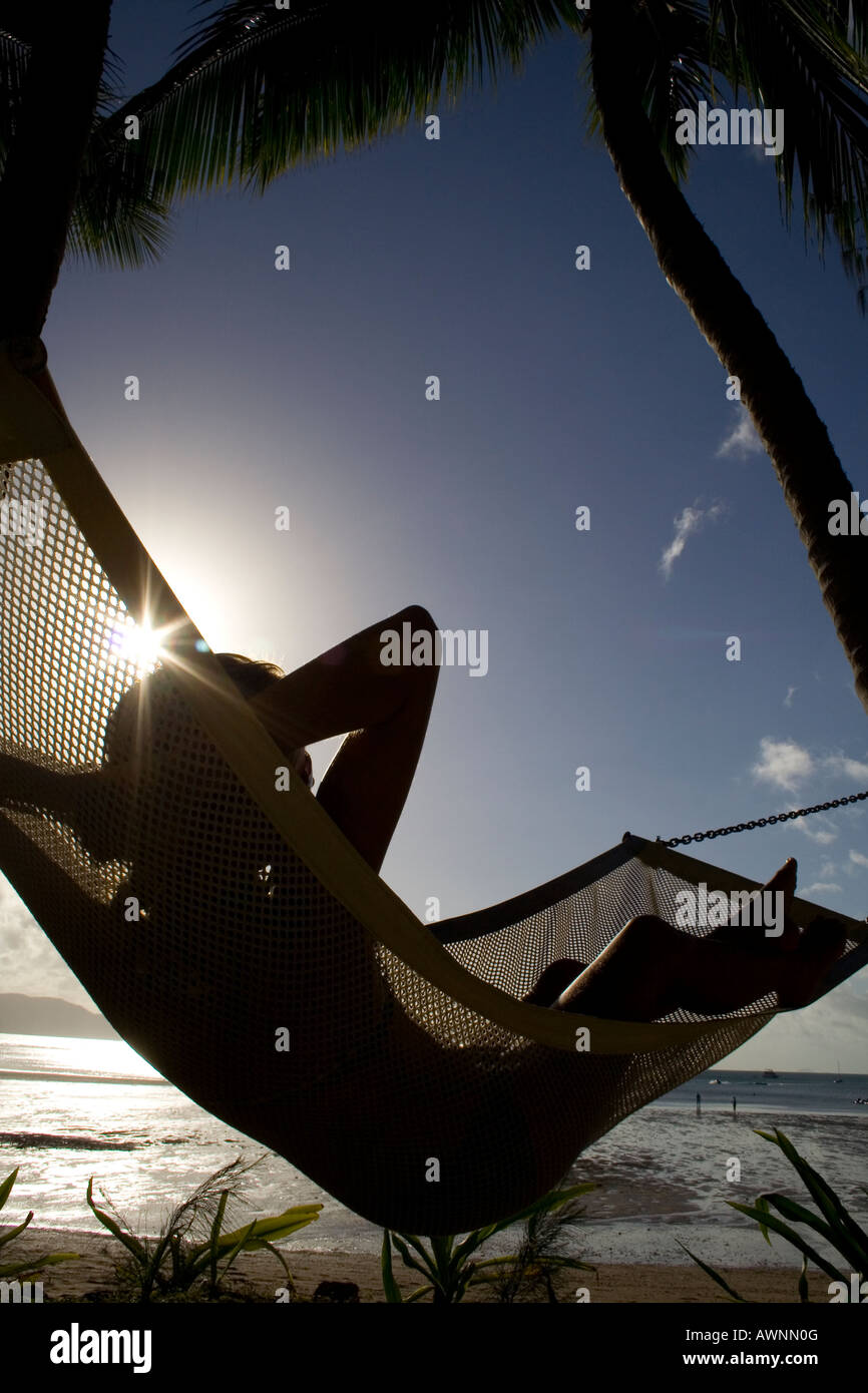person relaxing in a hommock Stock Photo - Alamy