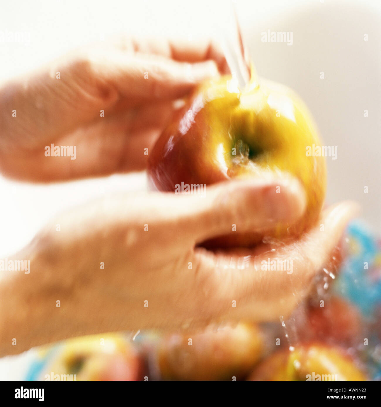 Person washing apples close hi-res stock photography and images - Alamy