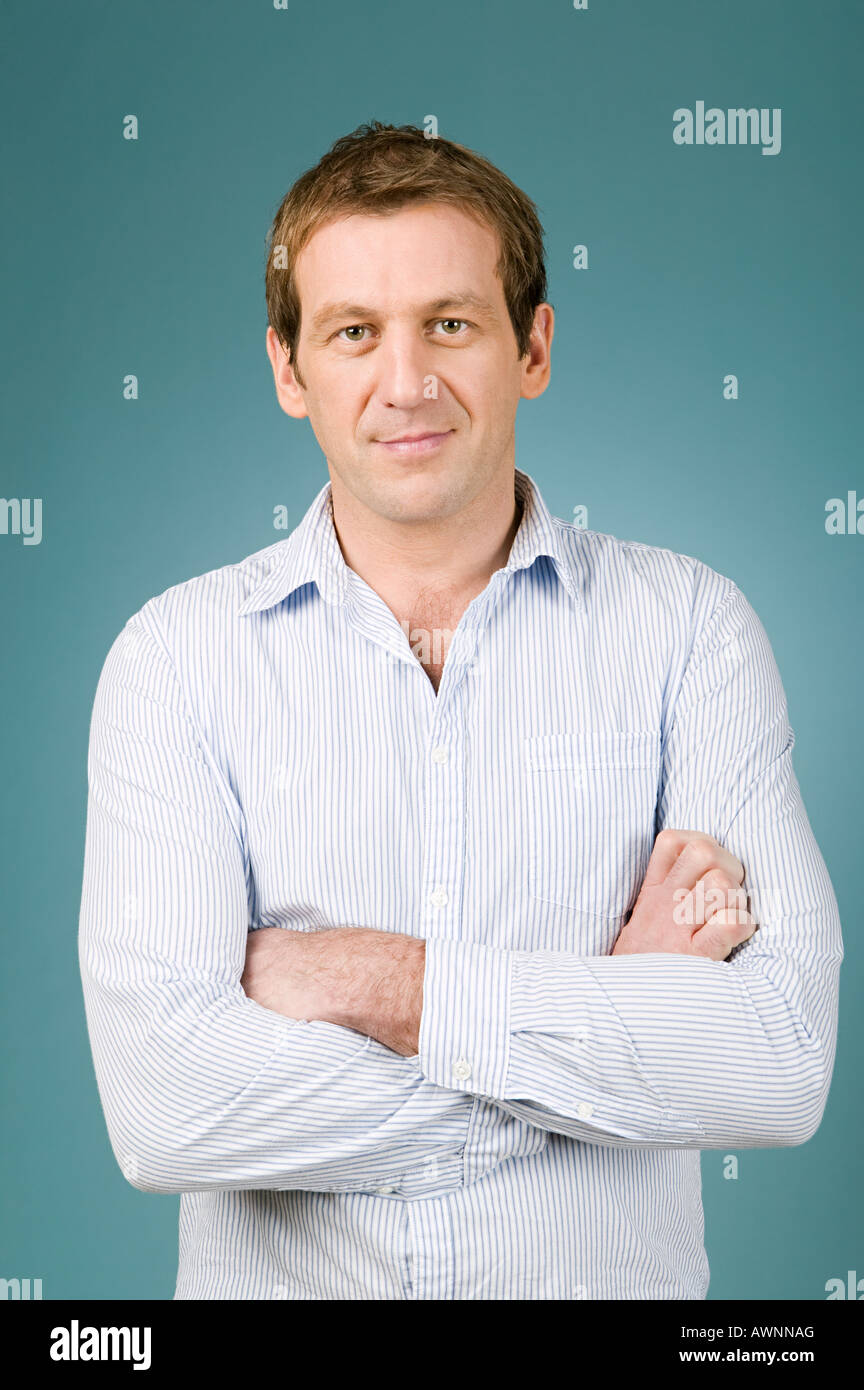 Man with arms crossed Stock Photo - Alamy