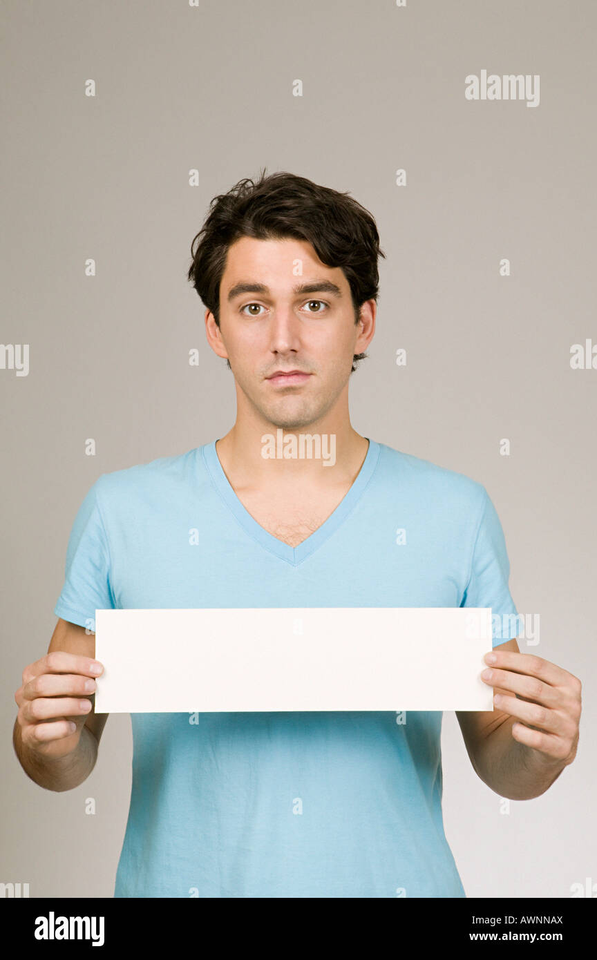 Man with a blank sign Stock Photo - Alamy