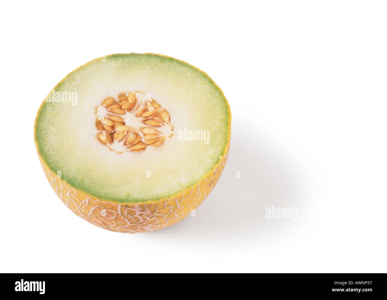 Honeydew melon half Stock Photo - Alamy