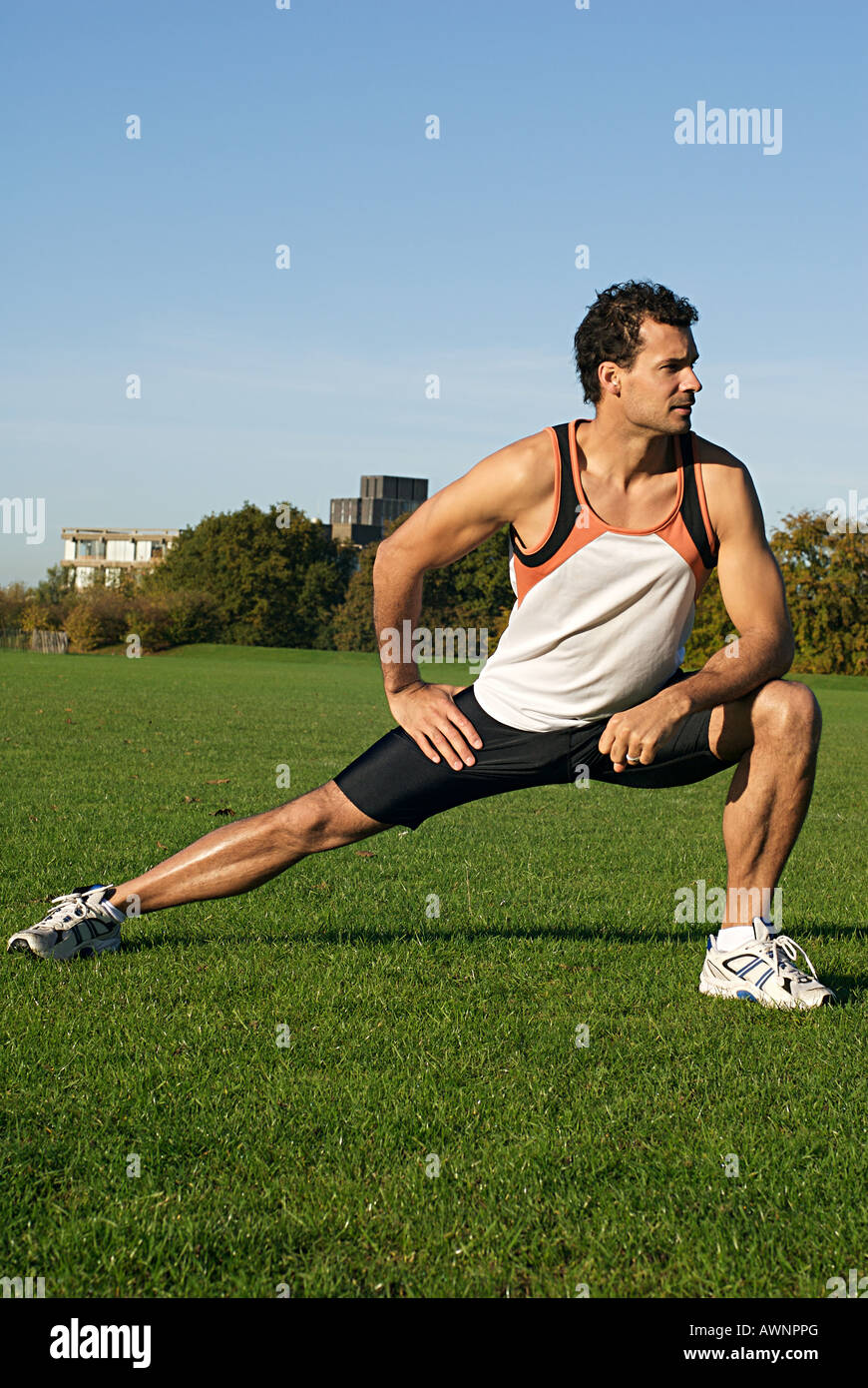 A man warming up Stock Photo - Alamy