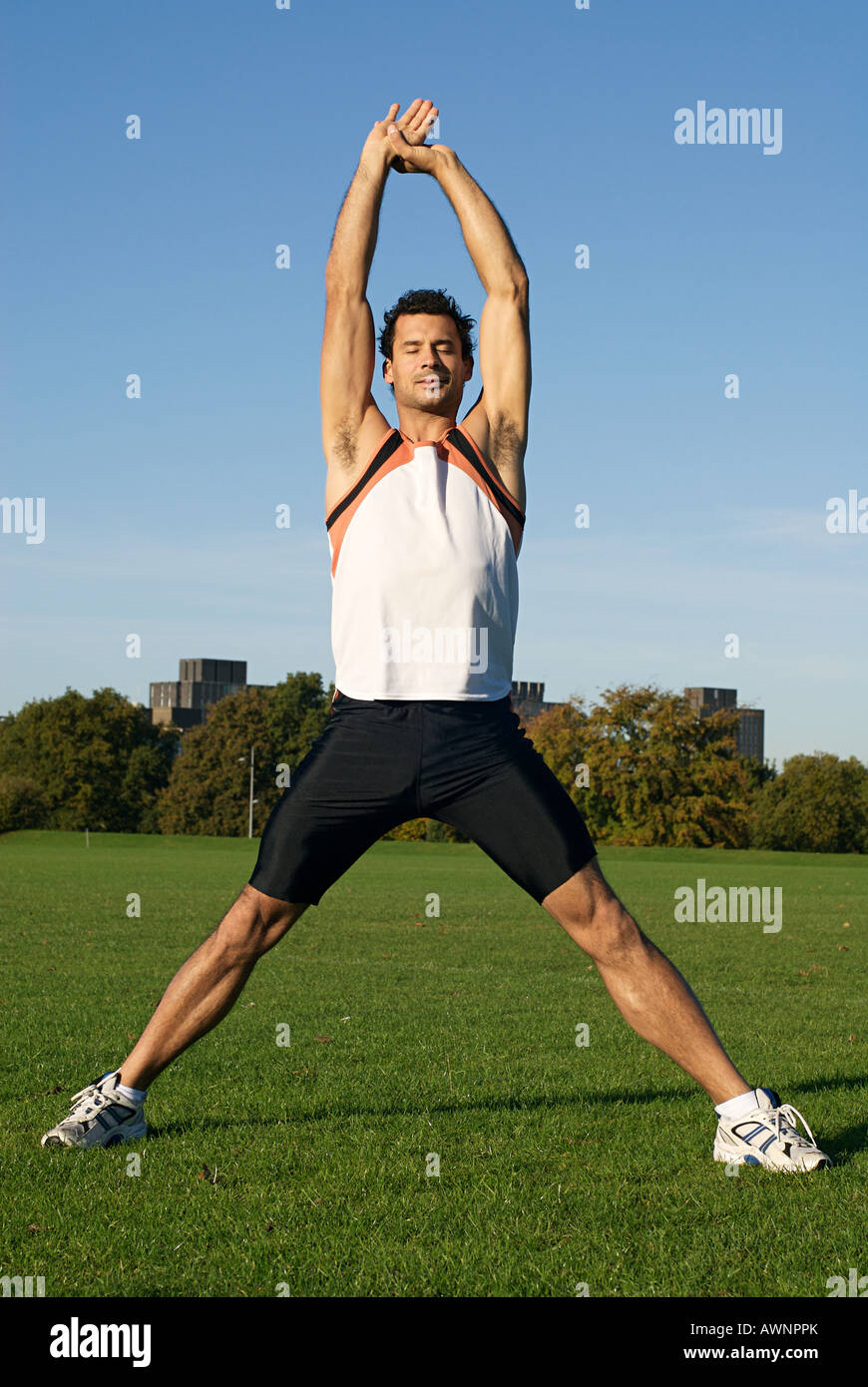 A man stretching Stock Photo - Alamy