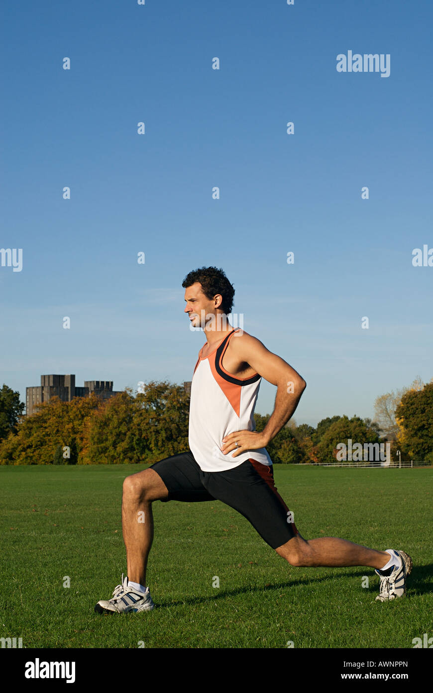 A man doing lunges Stock Photo - Alamy