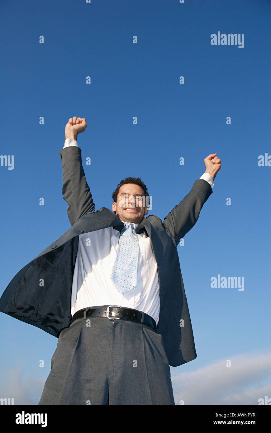 An elated businessman Stock Photo - Alamy