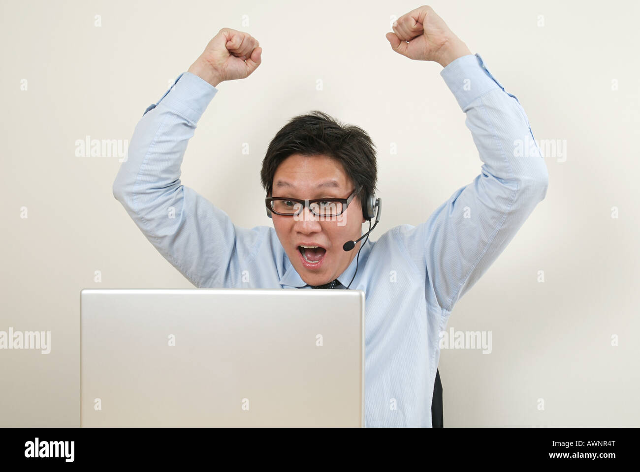 An elated businessman Stock Photo - Alamy
