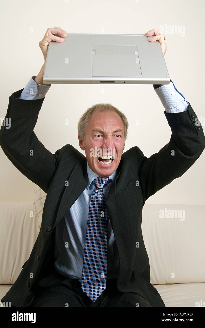 An angry businessman Stock Photo - Alamy